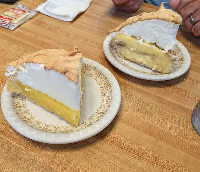 Two slices of meringue pie so tall and proud, they deserve their own zip code.