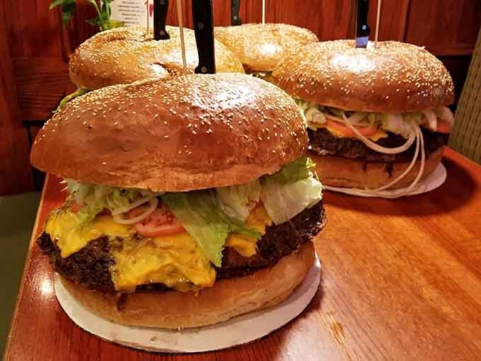 Sesame buns, melted cheese, and enough beef to make a grown adult go completely silent with joy.