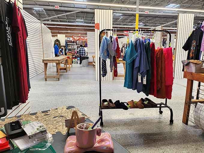 Clothing racks stretching into the distance, like a rainbow decided to open a boutique and skip the markup.