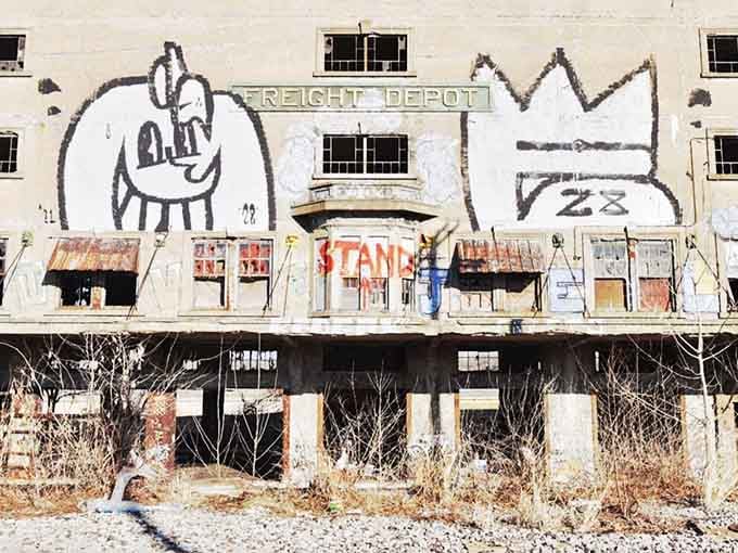 The "FREIGHT DEPOT" sign still stands proud, like a veteran telling stories to anyone who'll listen below.