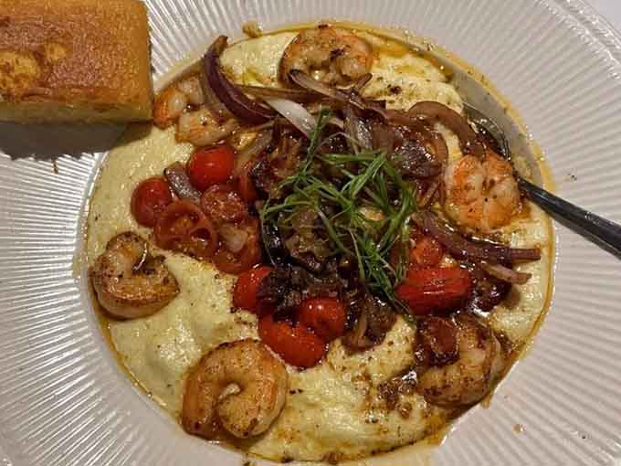 Creamy stone ground grits, jumbo Gulf shrimp, heirloom tomatoes. This bowl means serious, glorious business.