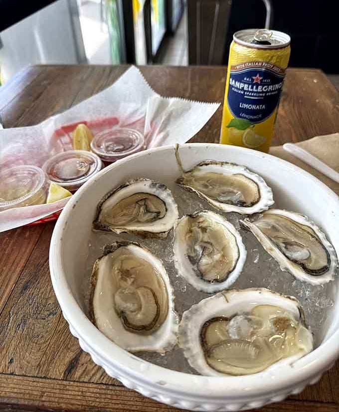 Fresh oysters on ice with a squeeze of lemon, because sometimes simple pleasures are the most sophisticated.