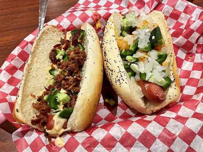 Two loaded dogs sitting pretty in a basket, proof that toppings are never just an afterthought.