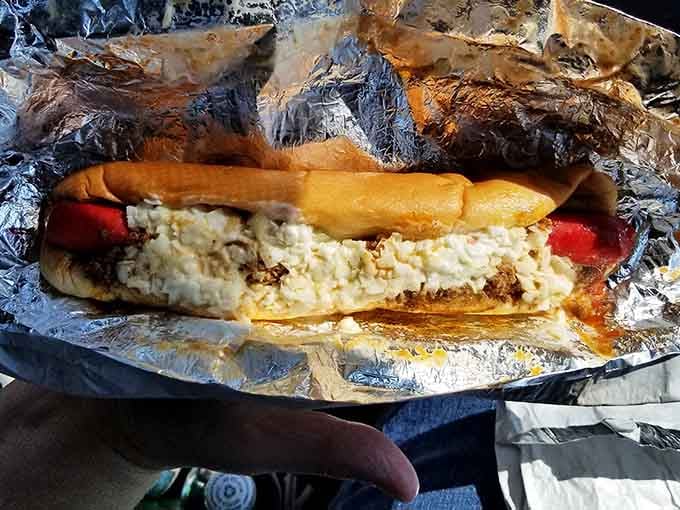 When your hot dog comes loaded with enough toppings to require architectural support, you know you're in the right place.