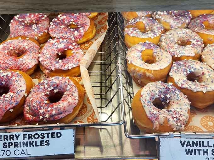 Strawberry and vanilla frosted donuts with sprinkles look like confetti celebrating every morning you decide to treat yourself right.
