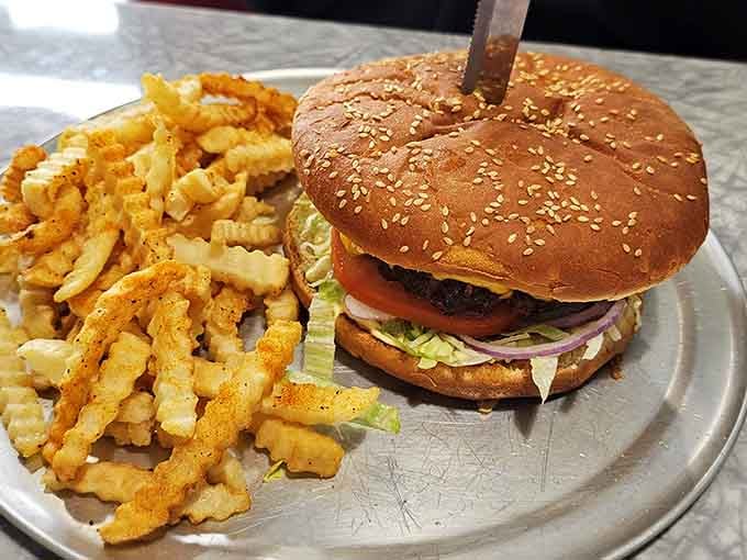 That sesame seed bun means business, and those crinkle-cut fries are the perfect supporting cast.