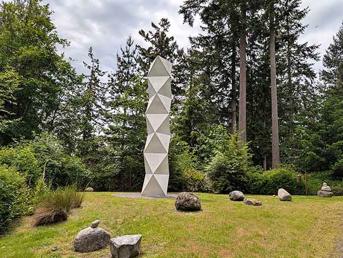 Rising like a geometric dream against a moody Washington sky, the Infinite Tower proves that modern art and ancient forest make wonderful neighbors.