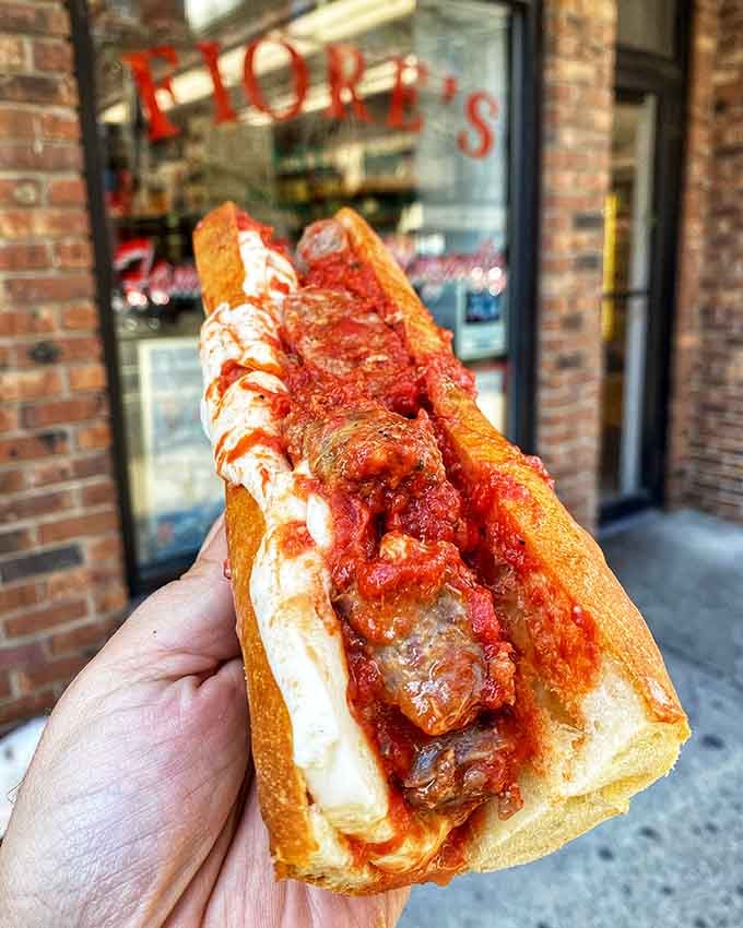 Sausage swimming in red gravy with mozzarella, proving that some Italian-American inventions rival anything from the old country.