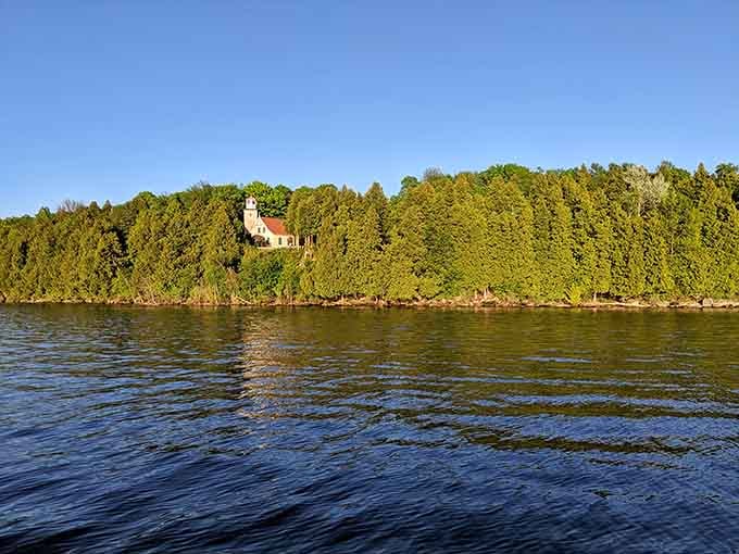 A lighthouse peeking through the trees, reminding you that some discoveries are worth the scenic route.