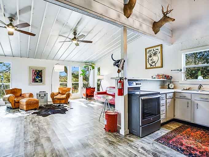 Mounted antlers, bold artwork, leather chairs, and a full kitchen. This shipping container interior has more personality than most apartments.