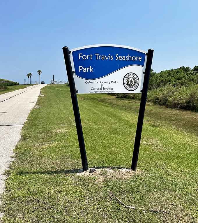 The sign says seashore park, but the concrete and history say something far more serious than a beach day.