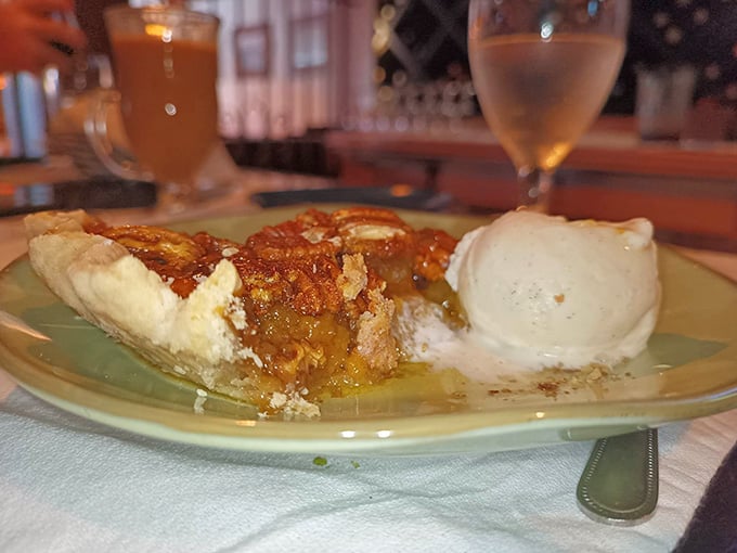 That golden filling, those caramelized pecans, that scoop of ice cream slowly melting alongside. Dessert doesn't get more honest than this.