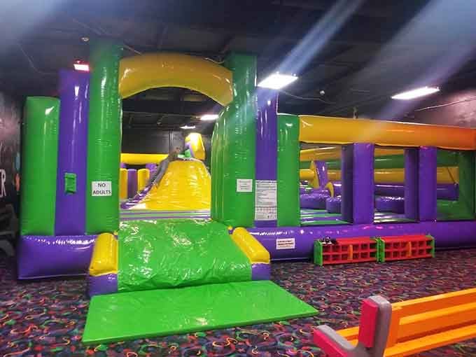 Bounce houses for the kids, and a "No Adults" sign that saves parents from themselves.