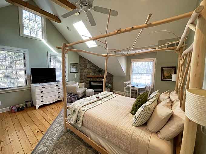 A hand-crafted branch bed frame under skylights. Sleeping here feels like a fairy tale.
