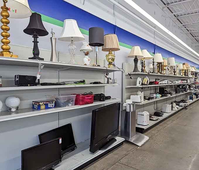 Lamps, televisions, small appliances lined up like old friends at a reunion, all priced to move and ready for a second life.