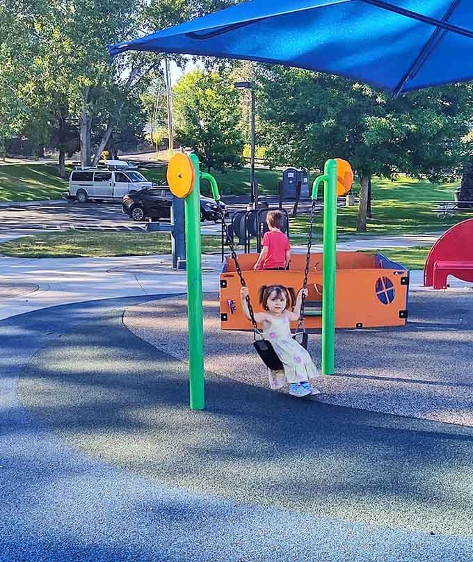 Swings designed for all abilities sit side by side, because childhood joy shouldn't come with restrictions or asterisks.