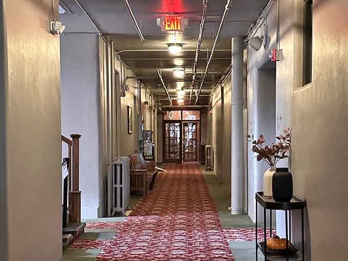 Long hallways, patterned carpet, and the quiet hum of a building that remembers everything.