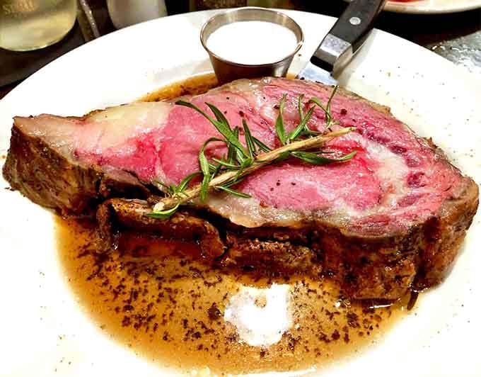 Pink, juicy, and crowned with a sprig of rosemary. This prime rib arrived looking like it won a beauty pageant.