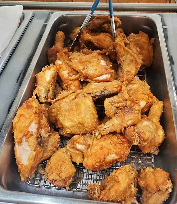 Golden, crispy, and piled high. This is the fried chicken that sells out at Julia's Talley House every single day.