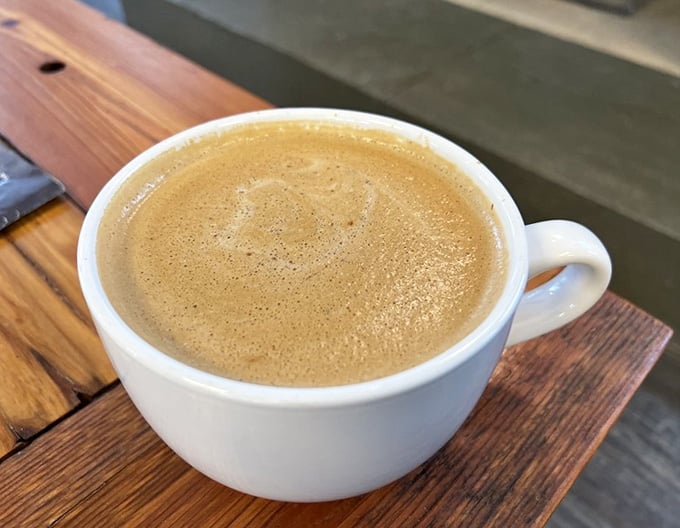 This velvety latte with its perfect crema looks like liquid gold in a cup, ready to jumpstart your morning.