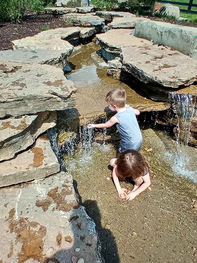 Little hands discovering the simple joy of splashing water, creating memories that'll outlast any video game high score.