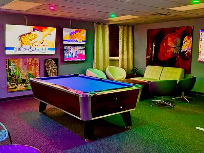 A VIP lounge where pool tables and comfy chairs prove bowling alleys can multitask beautifully.