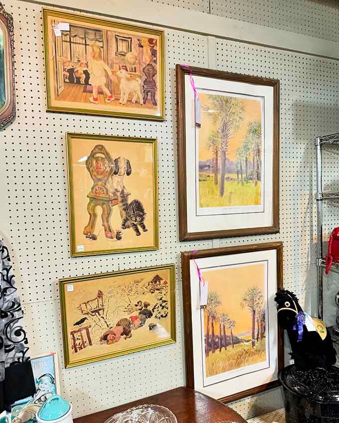 Framed prints and vintage artwork line the walls, each one waiting for someone to give it a new home.