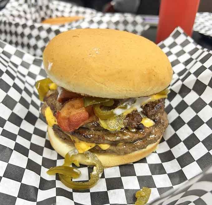 That charbroiled patty loaded with jalape&ntilde;os and bacon is the kind of burger that demands your full attention.