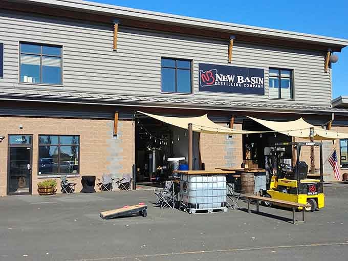 New Basin Distilling Company brings craft spirits and cornhole to the high desert, and honestly, nobody's complaining.