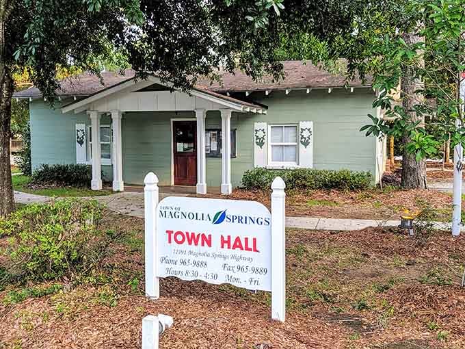 Small-town government never looked this charming, tucked behind a tidy white sign and a sage-green porch.