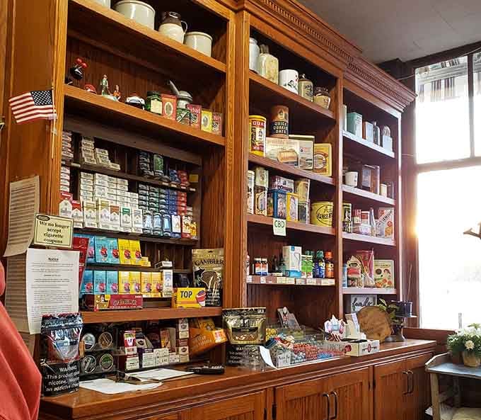 A beautiful old wooden cabinet stocked with goods, looking like it belongs in a time capsule. Charming.