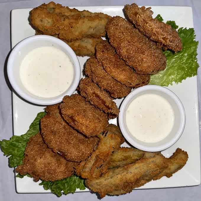 Golden, crispy, and served with dipping sauce, these fried green tomatoes are the reason road trips were invented.