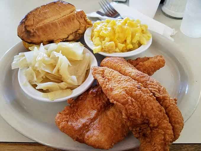Golden, crispy, and unapologetic. This fried catfish platter arrives like it has somewhere important to be.