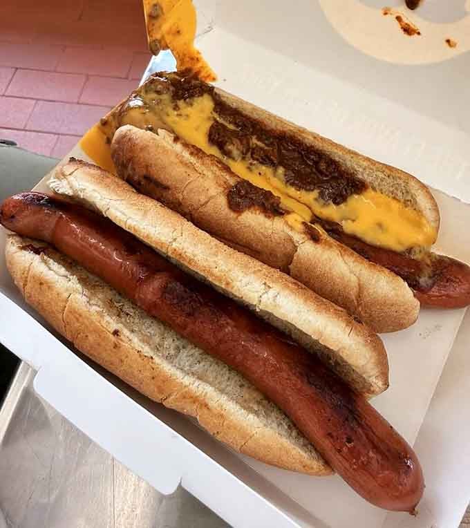 Two hot dogs walk into a box, one plain, one loaded with chili and cheese. Both of them win.