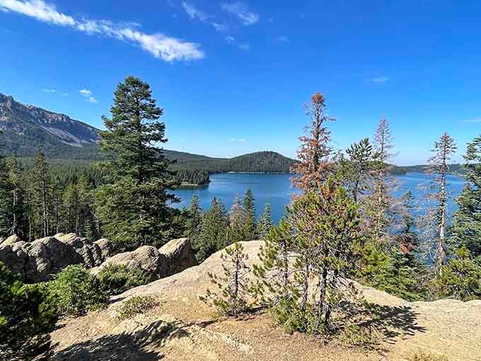 Rocky outcroppings frame Paulina Lake like a painting nobody could afford to hang in their living room.
