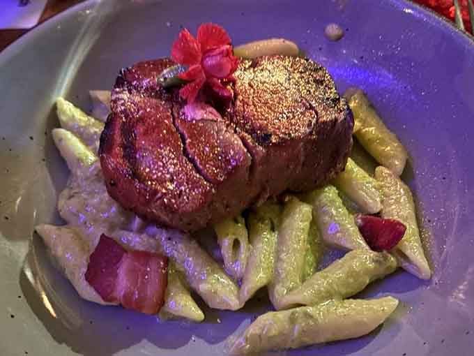 That filet mignon sits atop pasta like a crown jewel, proving Texas knows more than just barbecue.