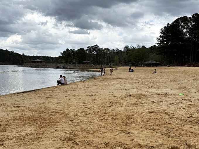 Even on a cloudy day, this beach has people showing up with towels and zero regrets.