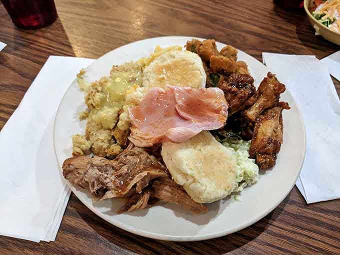 This plate represents the beautiful chaos of buffet decision-making: why choose when you can have everything?