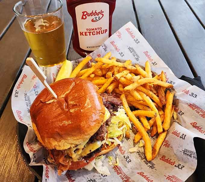 Golden fries and a burger stacked high, the kind of lunch that makes you cancel your afternoon plans.