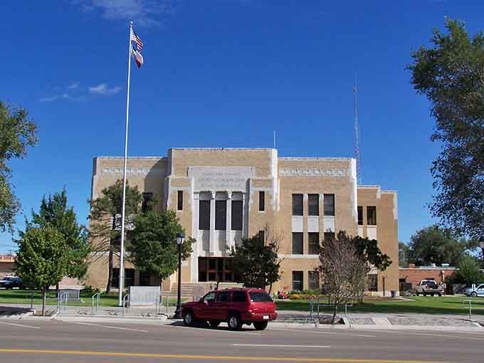 The Ochiltree County Courthouse stands with the quiet confidence of a building that has seen everything and still isn't impressed by your drama.
