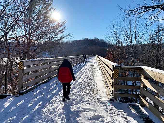 Nothing says Minnesota adventure quite like bundling up for a snowy bridge walk.