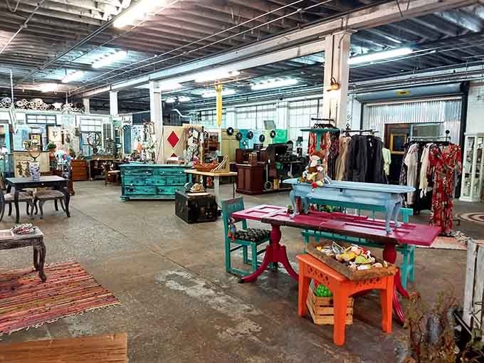 Splashes of turquoise, red, and orange furniture fill the floor, proof that color therapy doesn't require a doctor's prescription.