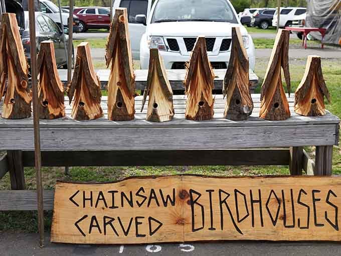 Chainsaw-carved birdhouses that prove art doesn't always need a gallery, just a good sharp blade.