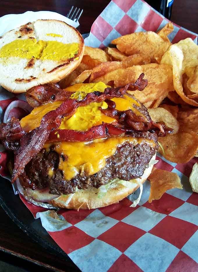 Bacon, melted cheddar, and a burger that means serious business. This is not a casual commitment.