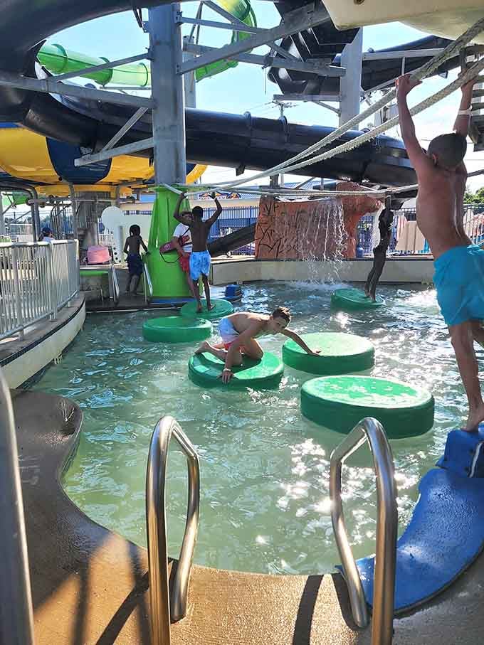 Stepping stones, rope grips, and splashing water, this little corner of the park is where coordination goes to be tested.