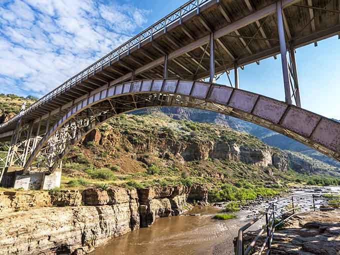 This engineering marvel spans the canyon with grace, proving humans occasionally get it right when working with nature's grandeur.