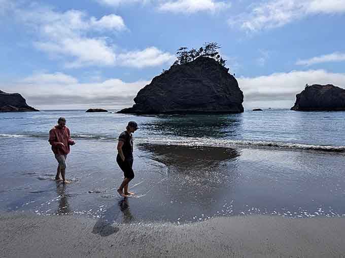 Two people, one spectacular sea stack, and zero complaints. This is what a good day looks like.