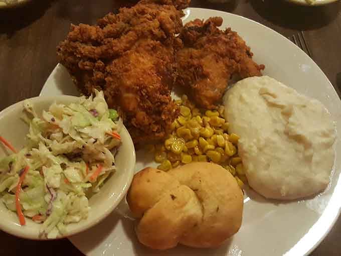 Golden, crispy fried chicken with all the fixings. This plate is a love letter to everything right about comfort food.