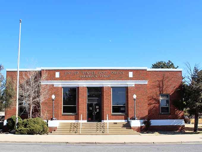 Shamrock's post office stands so neat and dignified under that cobalt sky, it practically salutes you back.