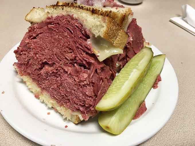 That's not a sandwich, that's a commitment. Slyman's Reuben arrives like it owns the plate.